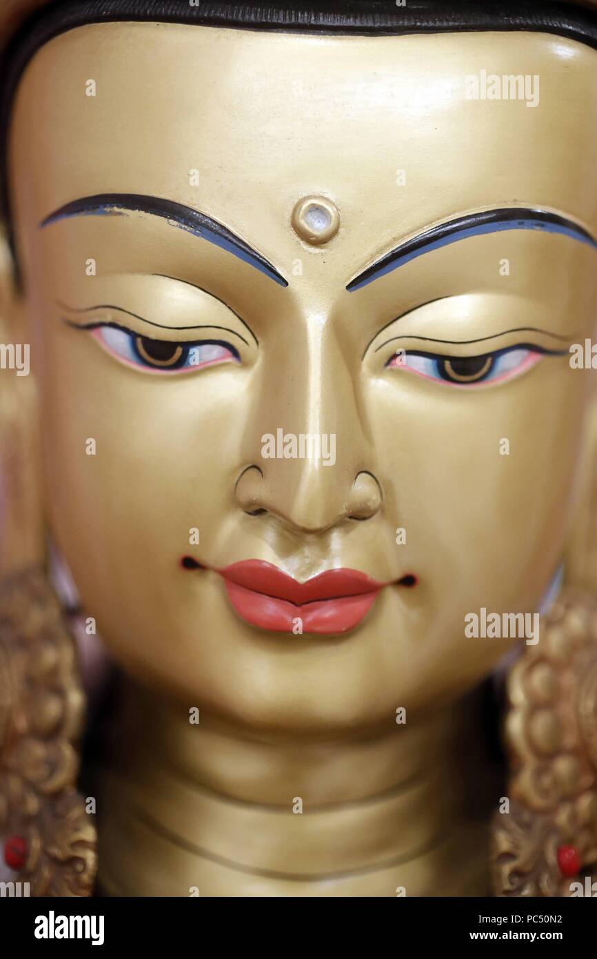 Golden Buddha statue. The head with the third eye. Ho Chi Minh city ...