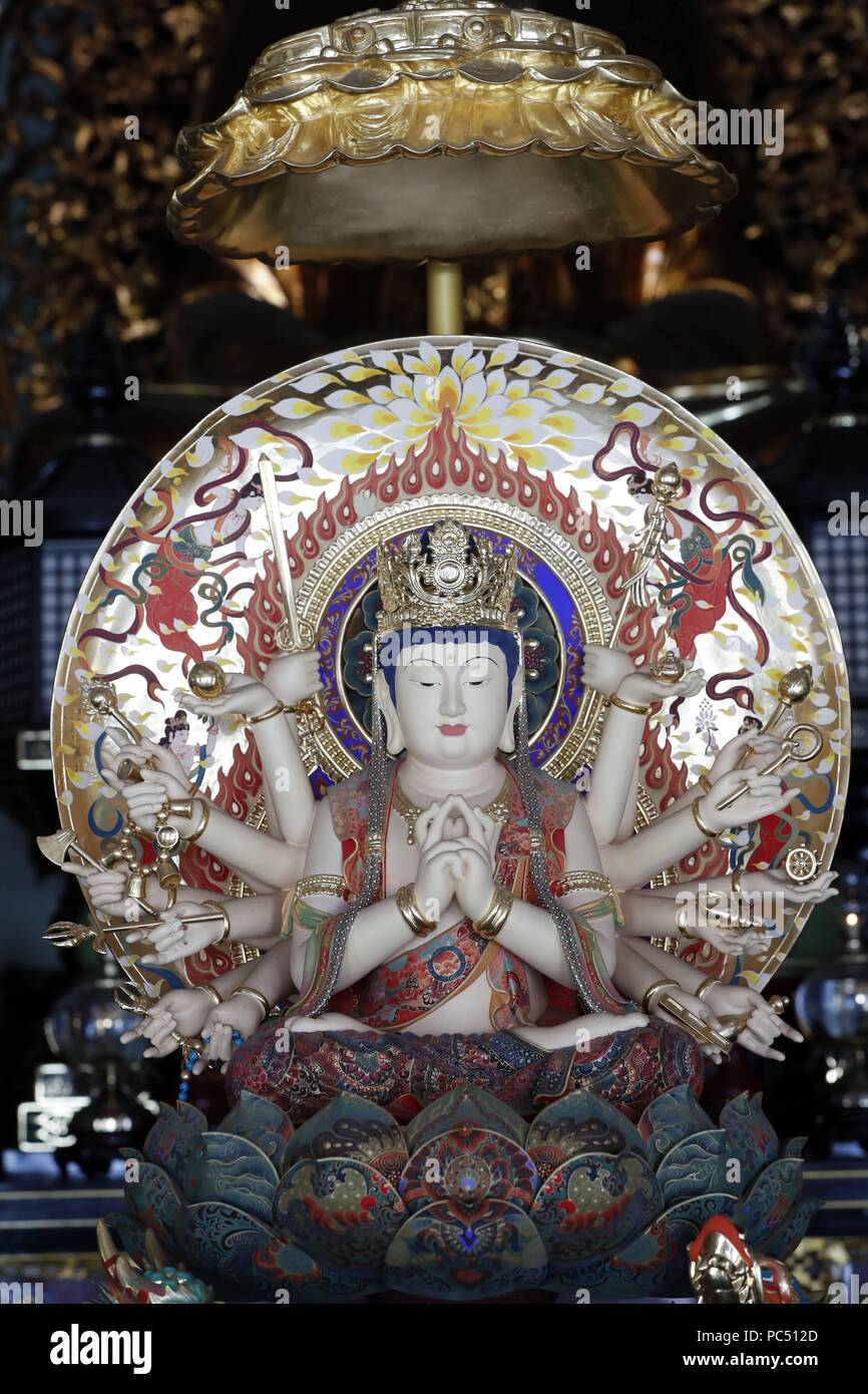 Thousand-armed Avalokitesvara, the Bodhisattva of Compassion. Statue ...