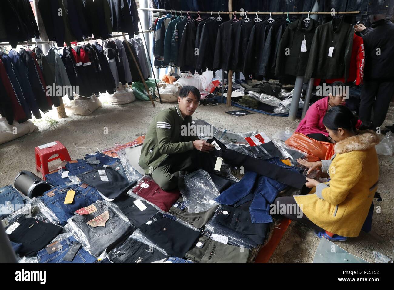 Stalls selling cloth in Van Quan market. Van Quan. Vietnam. | usage ...