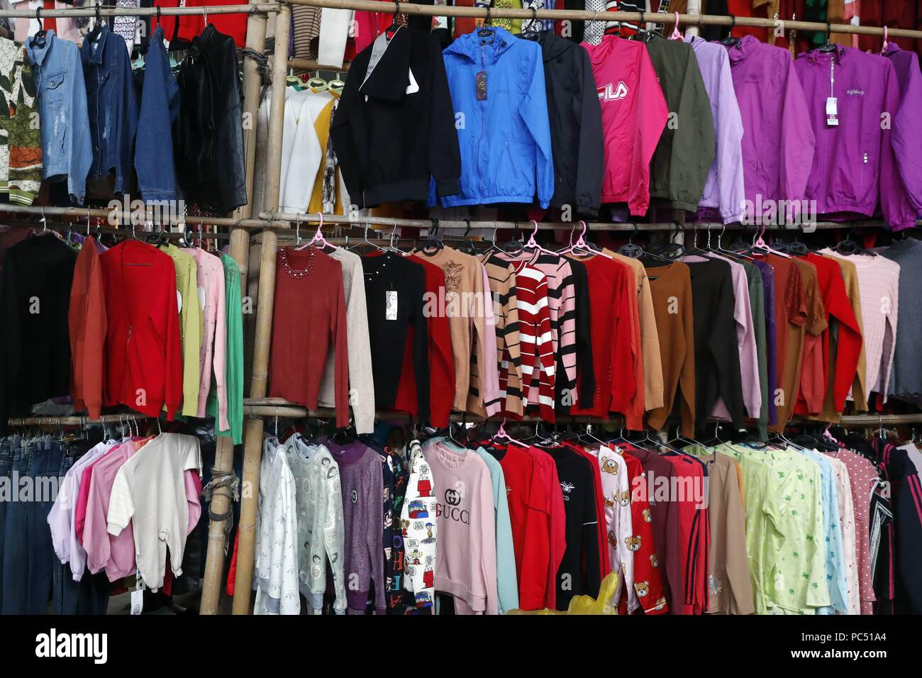 Stalls selling cloth in Van Quan market. Van Quan. Vietnam. | usage ...