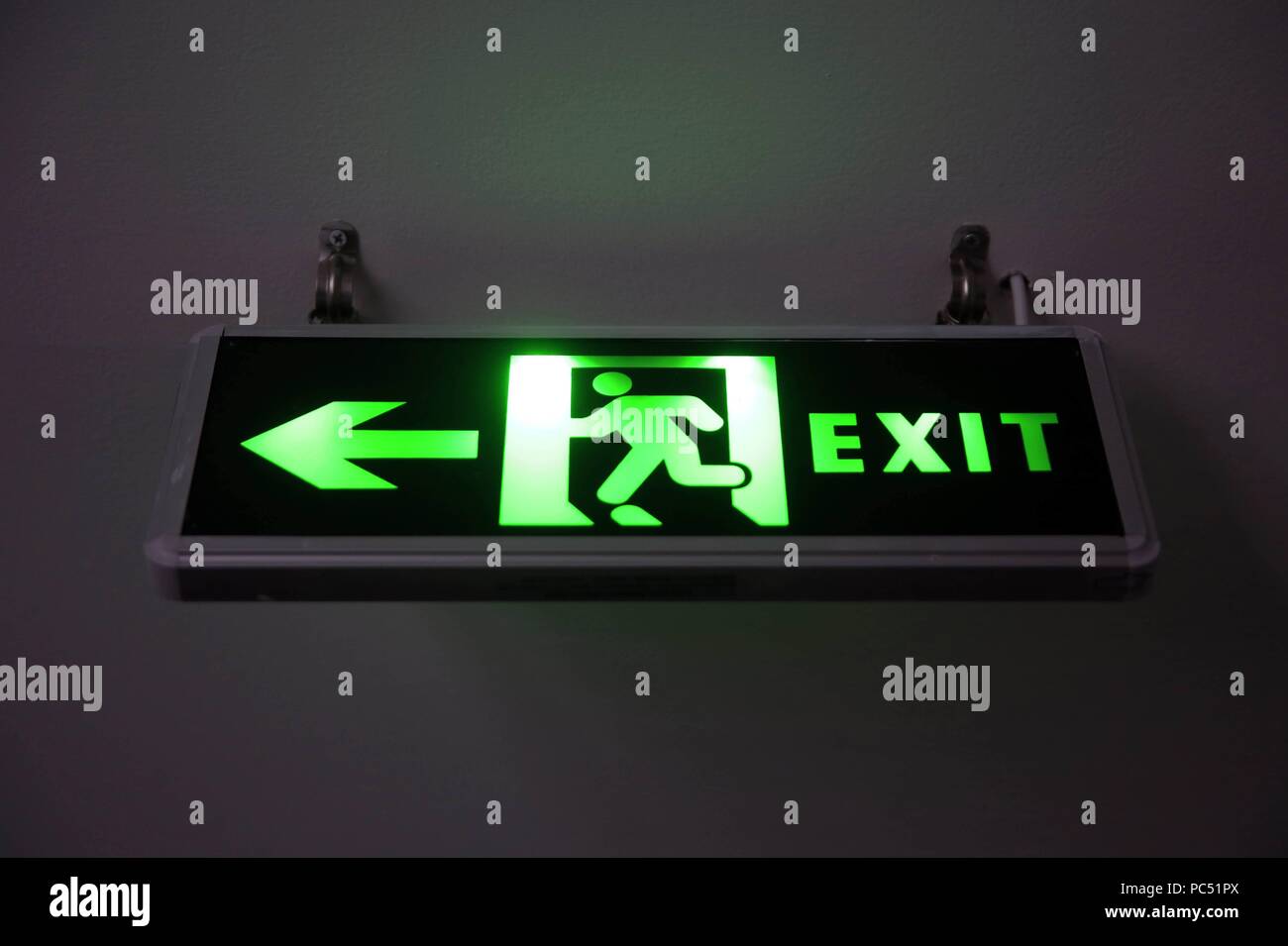 Illuminated green exit sign. Phu Quoc. Vietnam. | usage worldwide Stock ...
