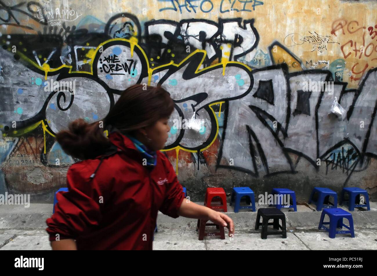 Typical street of the Old Quarter in Hanoi. Graffiti on wall. Hanoi ...