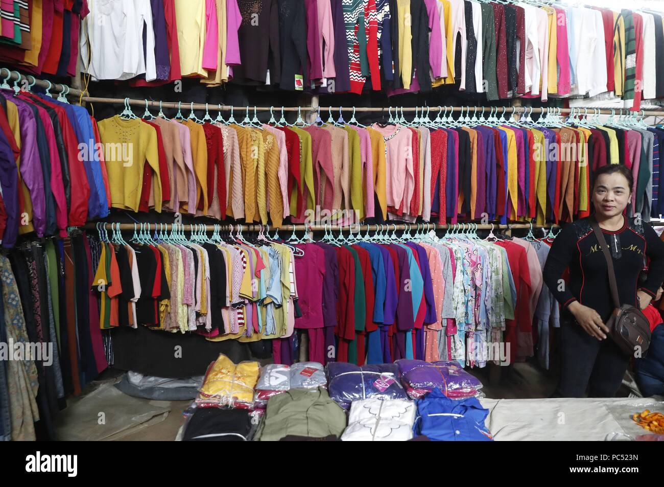 Stalls selling cloth in Van Quan market. Van Quan. Vietnam. | usage ...