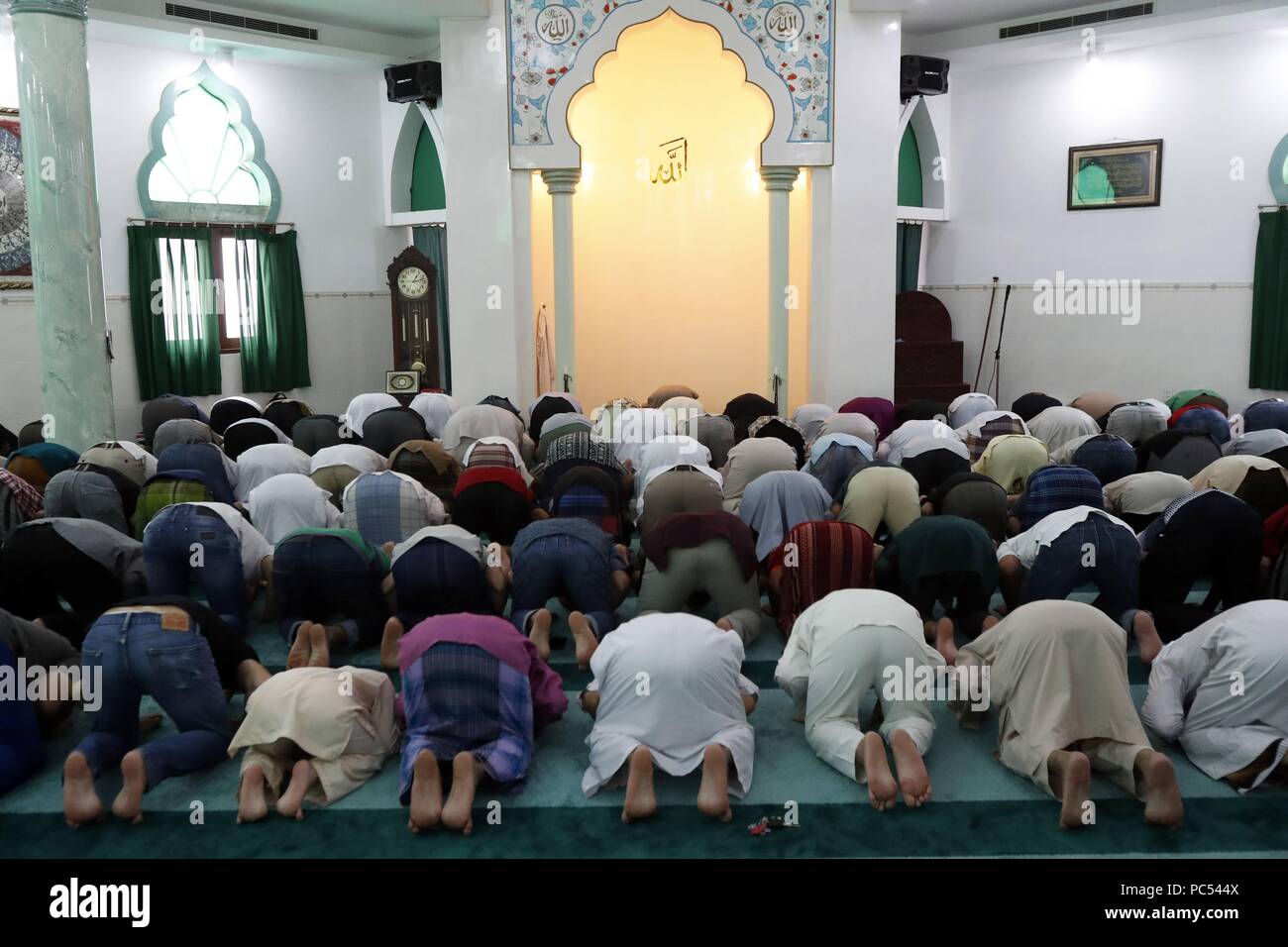 Masjid Al Rahim Mosque. The friday prayer (salat). Muslim men praying ...