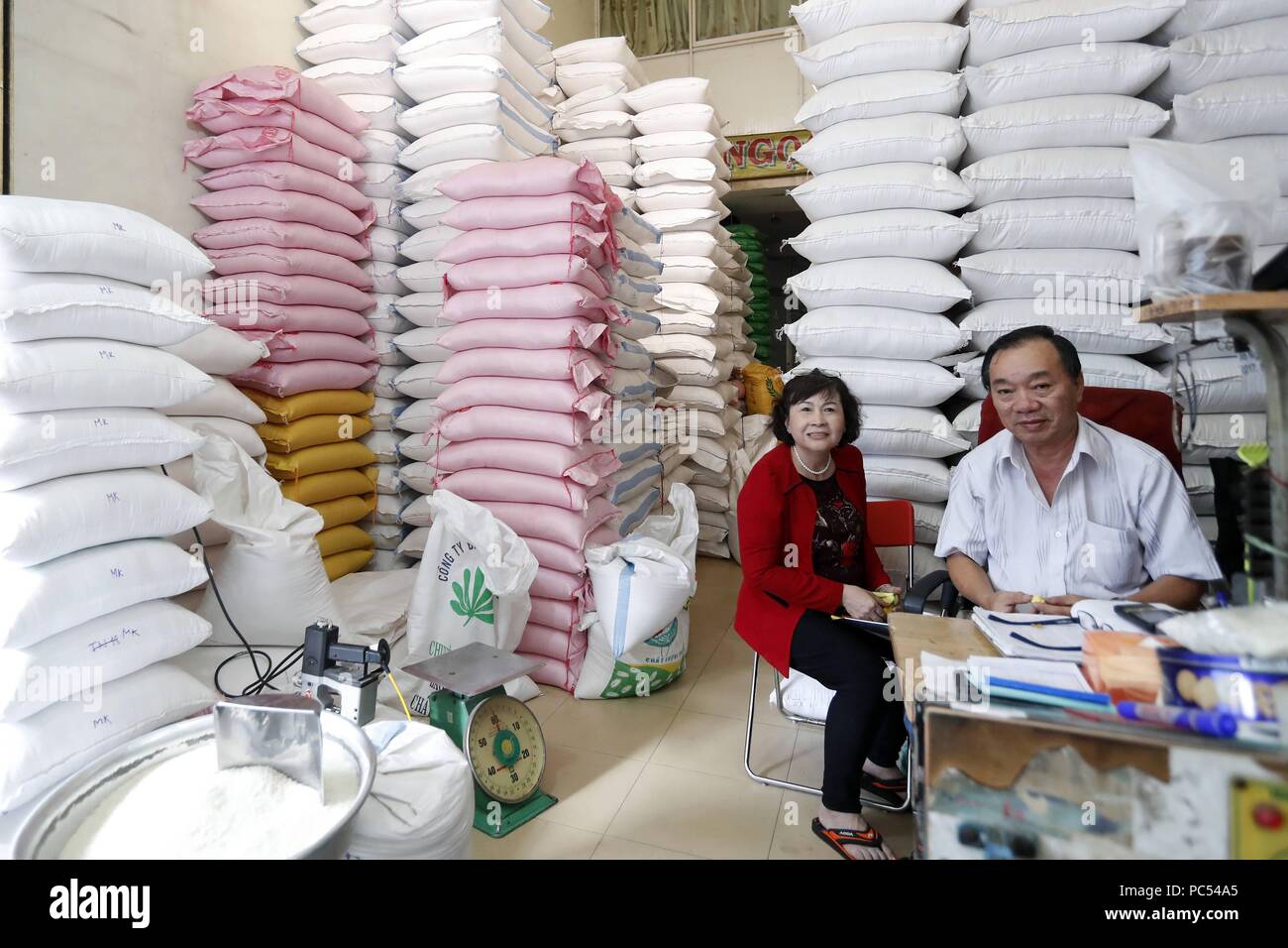 Rice bags for sale at local market. Ho Chi Minh City. Vietnam. | usage ...