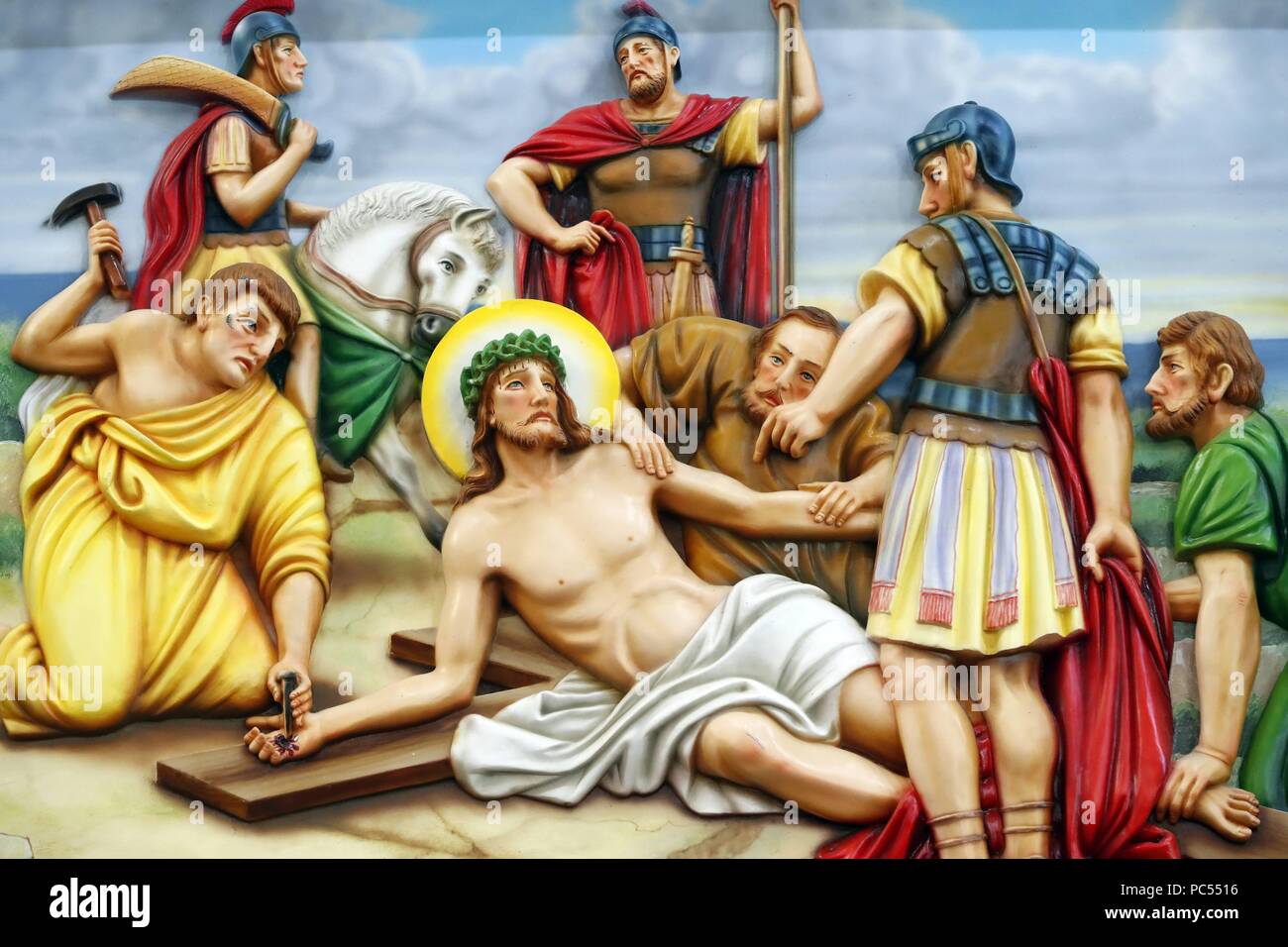 Our Lady of Fatima church. Way of the cross. Station 11. Jesus is nailed to the cross. Ho Chi ...