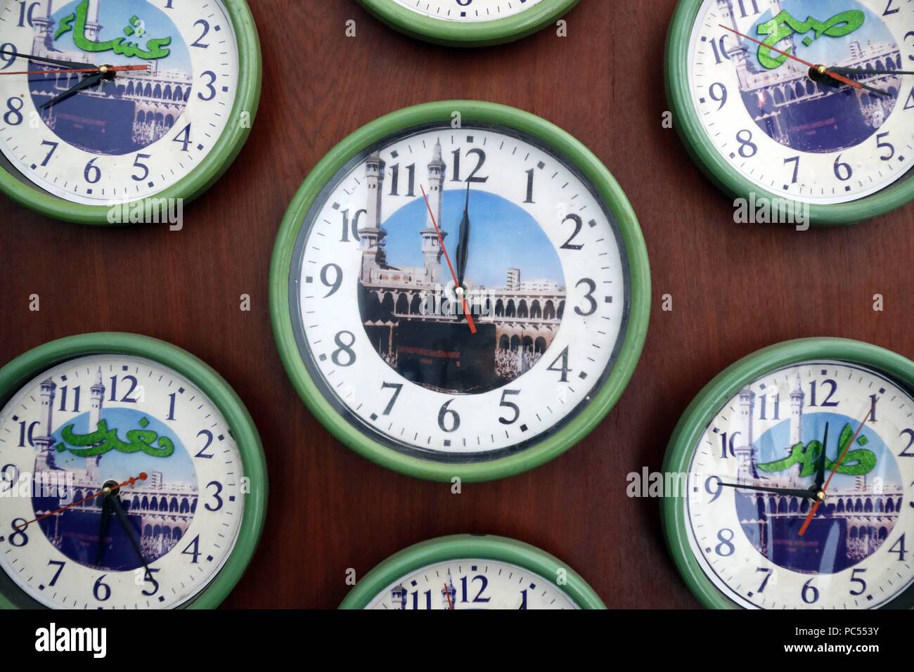 Masjid Al Rahim Mosque. Islamic prayer clock showing the time for the ...