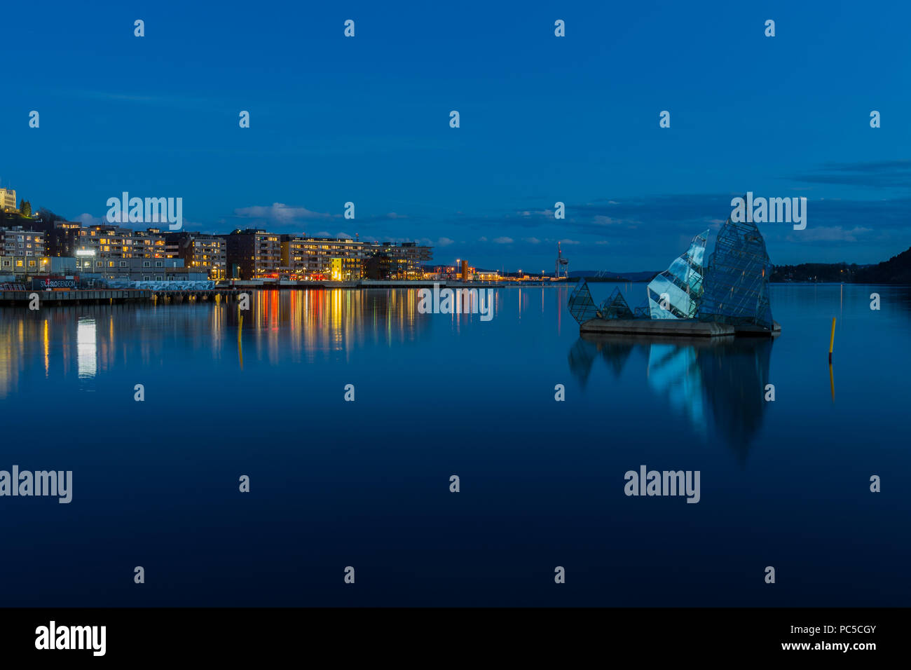 Exterior night view of the city and the glass structure art in the ...