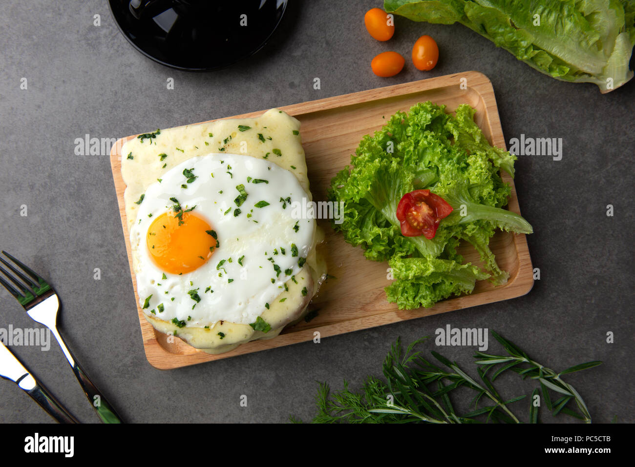 croque madame toast with egg and cheese Stock Photo - Alamy