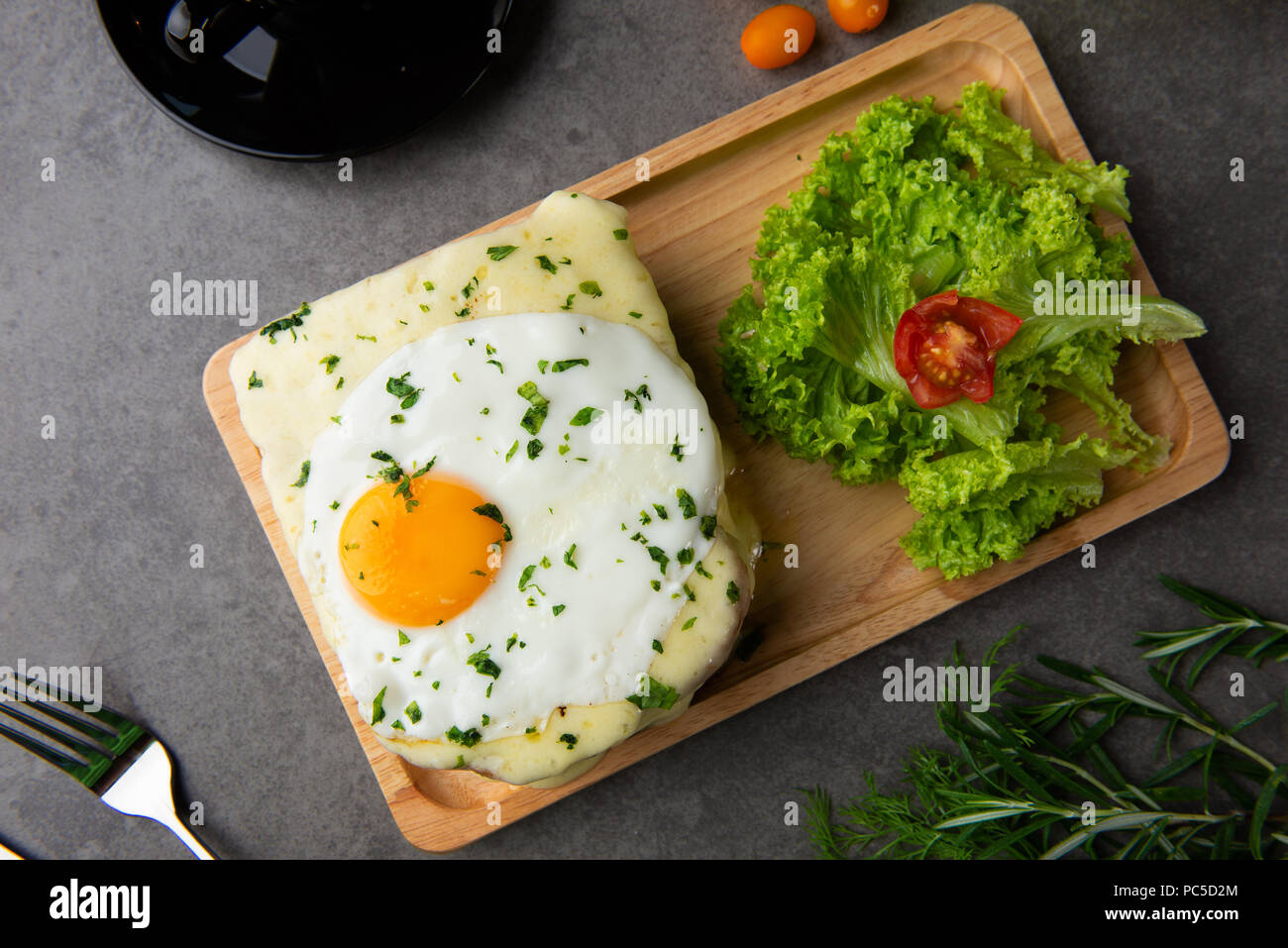 croque madame toast with egg and cheese Stock Photo - Alamy