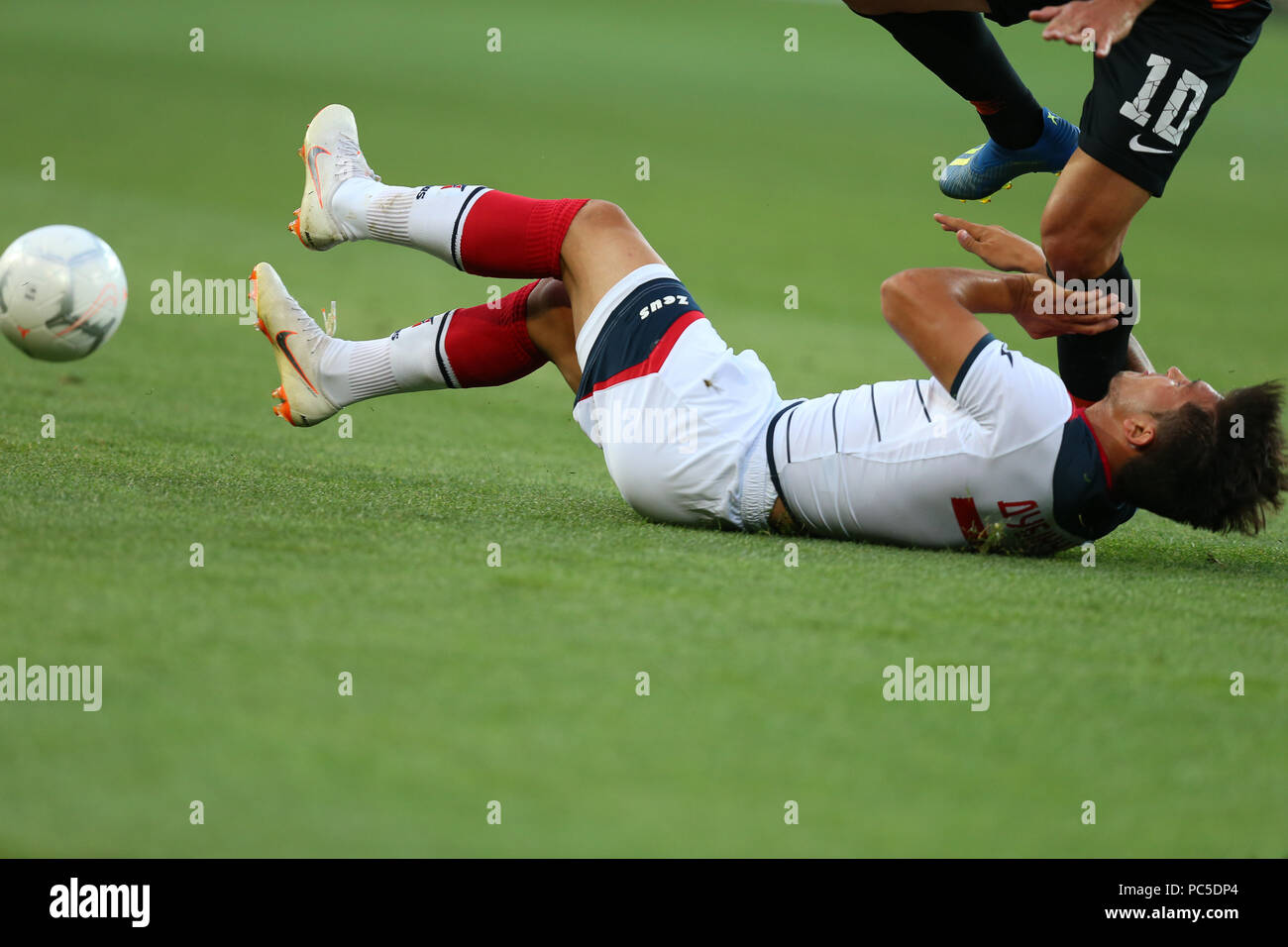 Dangerous sliding tackle hi-res stock photography and images - Alamy