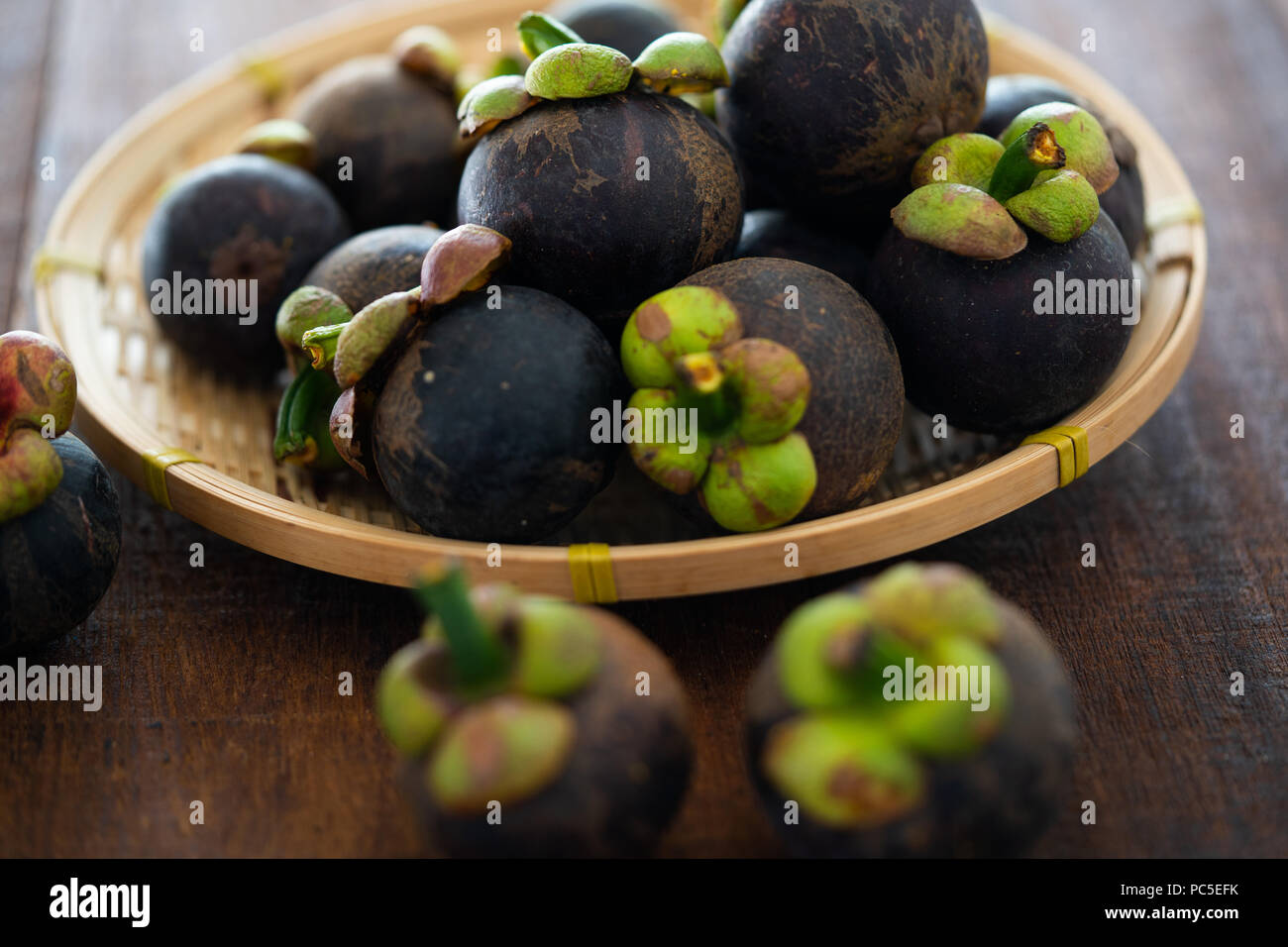 Mangosteen tropical fruit Stock Photo - Alamy