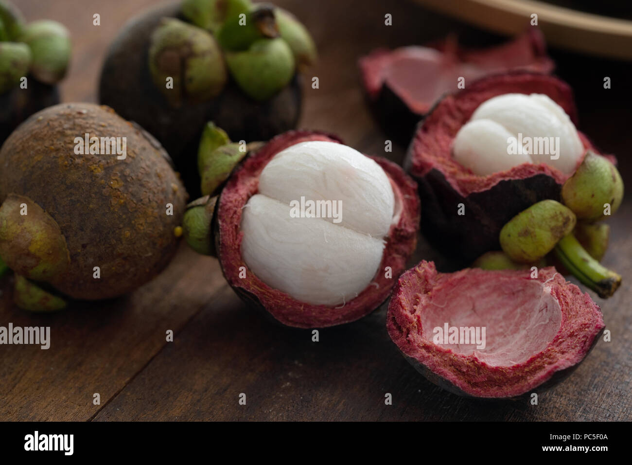 Mangosteen tropical fruit Stock Photo - Alamy