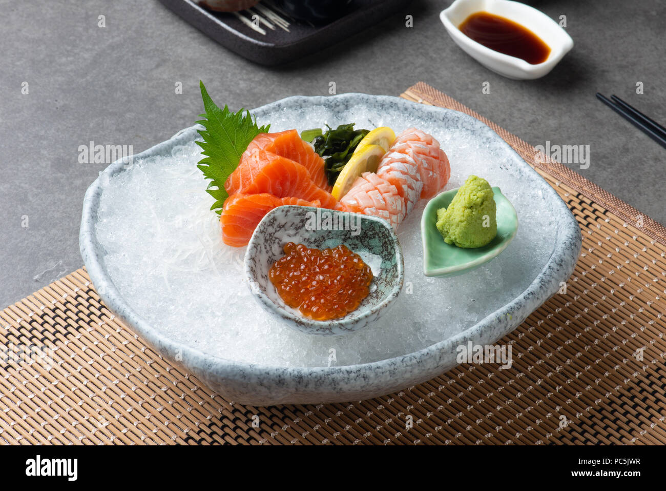 assorted sashimi sushi on shaved ice Stock Photo - Alamy