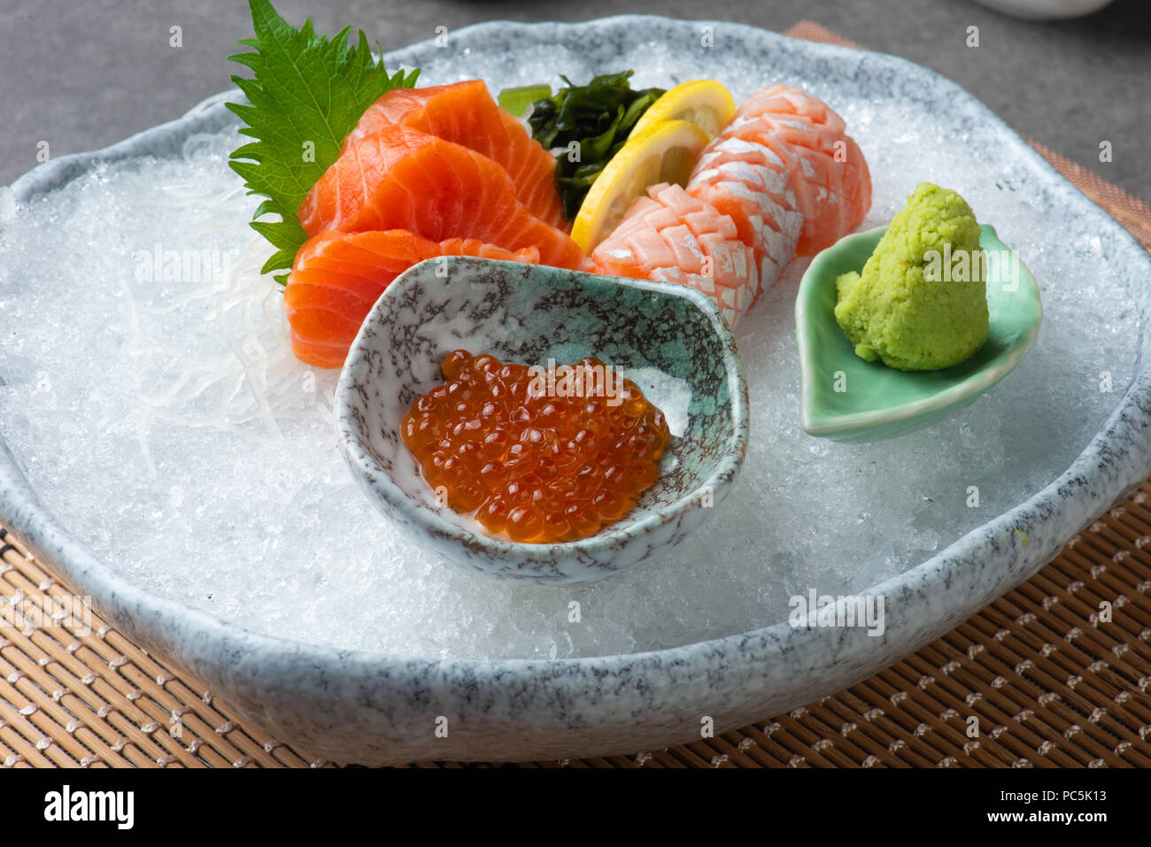 assorted sashimi sushi on shaved ice Stock Photo - Alamy