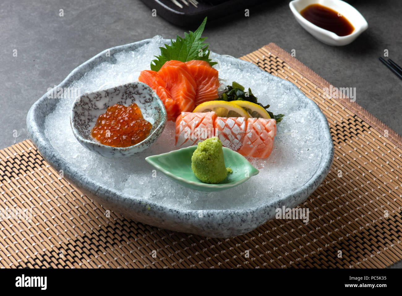 assorted sashimi sushi on shaved ice Stock Photo - Alamy