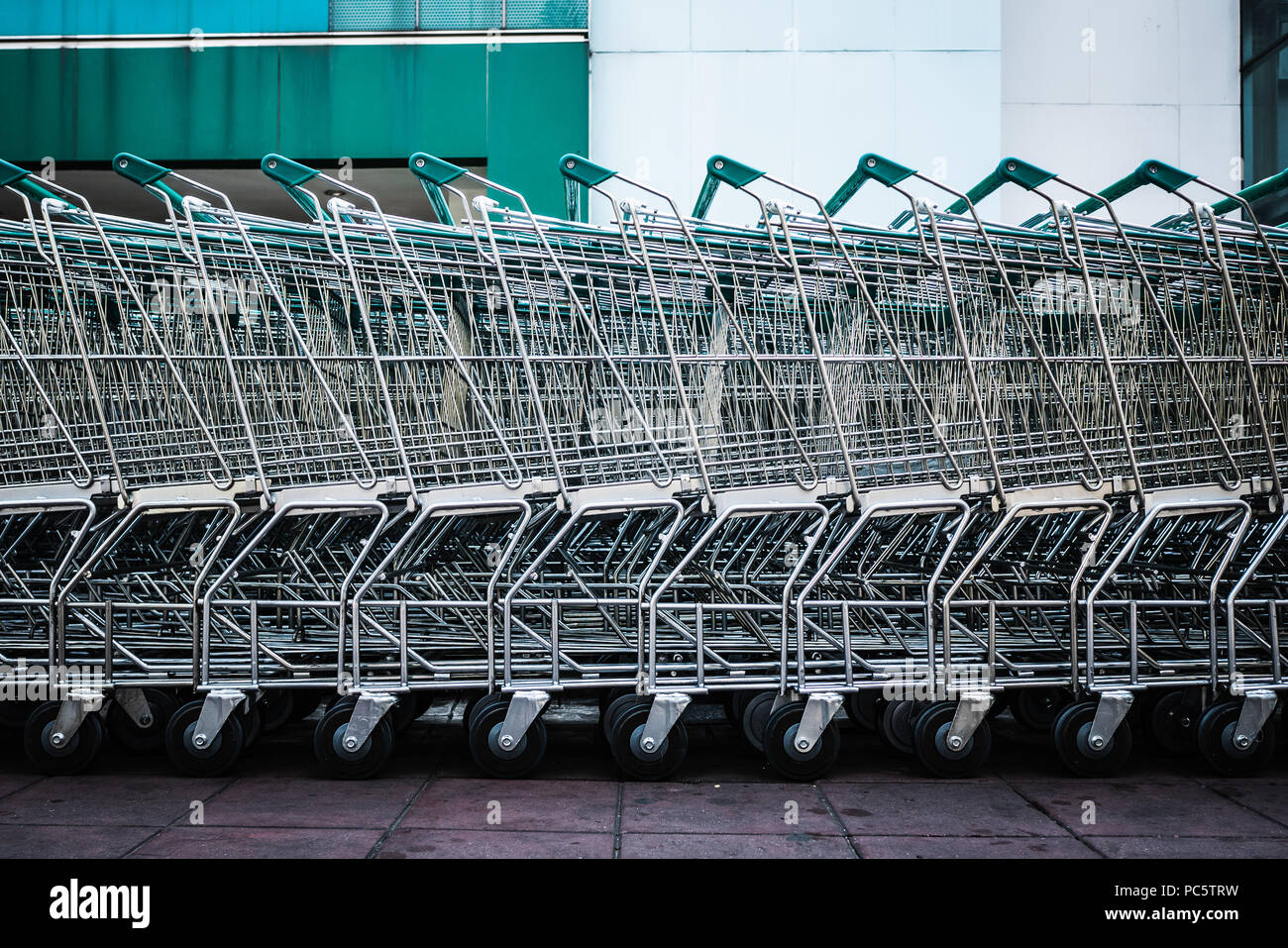 Shopping carts at supermarket Stock Photo - Alamy