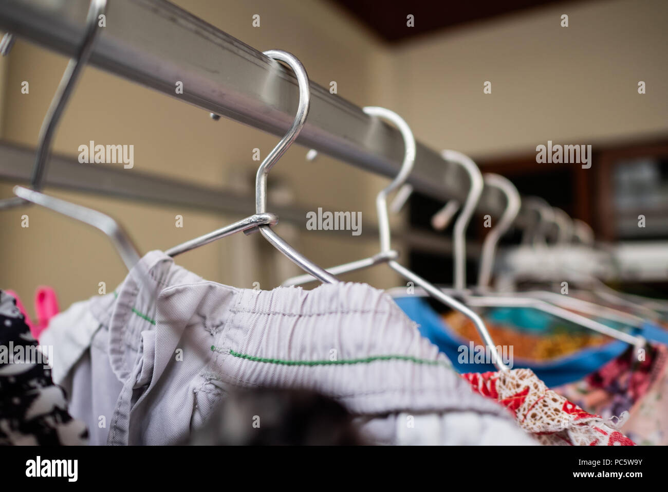 Clothes hanging on the clothes hanger on the clothesline Stock Photo ...