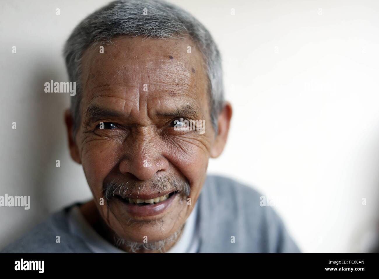 Bahnar (Ba Na) ethnic group. Portrait of old man. Kon Tum. Vietnam ...