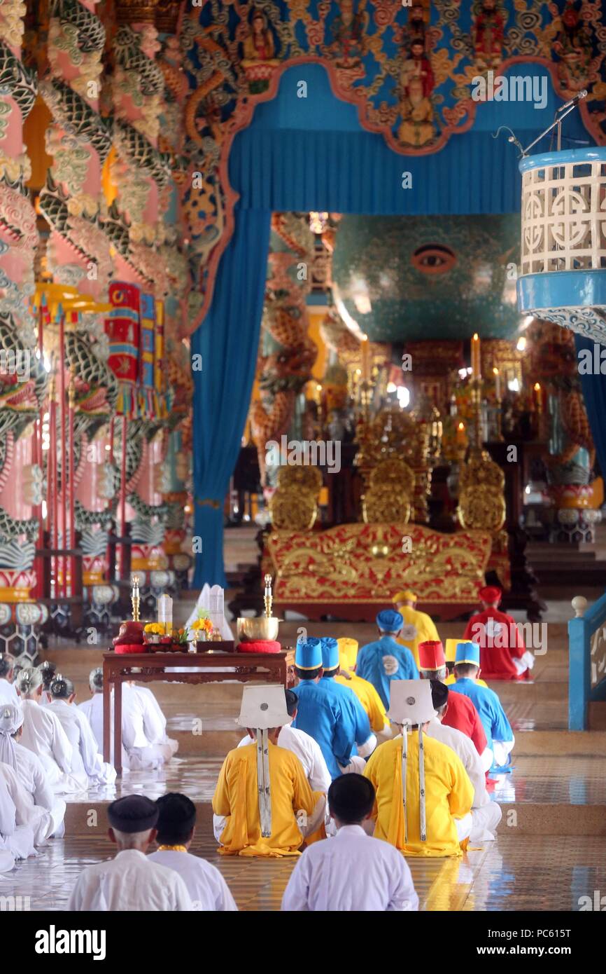 Cao Dai Holy See Temple. Caodaist service with priests. Thay Ninh ...