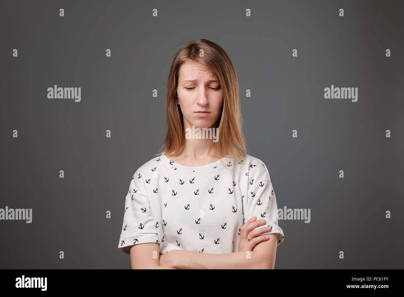 young european sad woman serious and concerned looking worried and ...