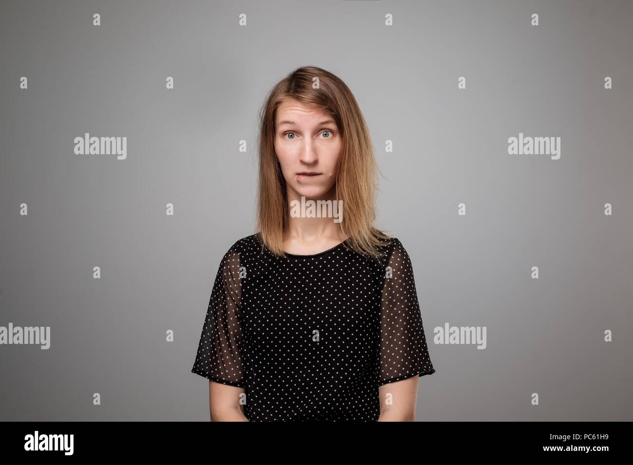 young european sad woman serious and concerned looking worried and ...