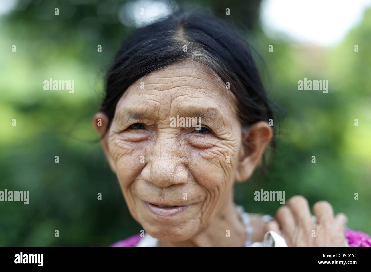 Bahnar (Ba Na) ethnic group. Portrait of old woman. Kon Tum. Vietnam ...