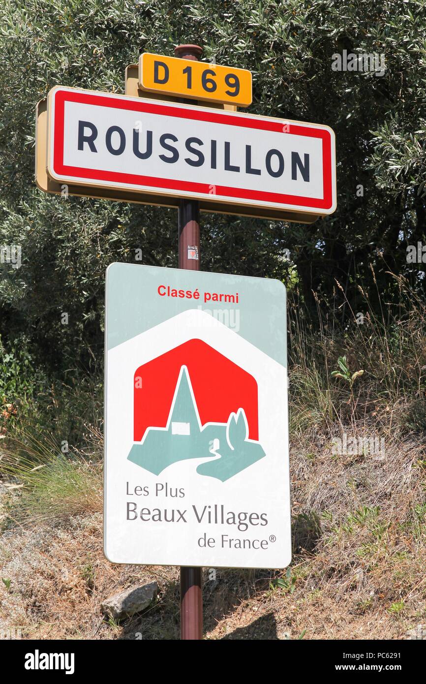 Roussillon, France - July 7, 2018: Roussillon village road sign and the ...