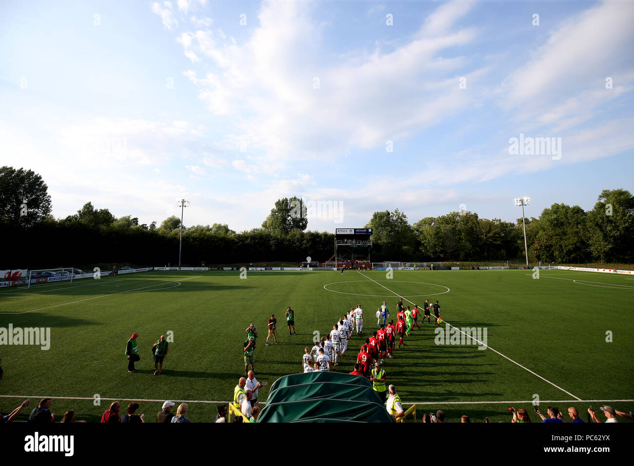 The two teams walk out before kick-off Stock Photo - Alamy