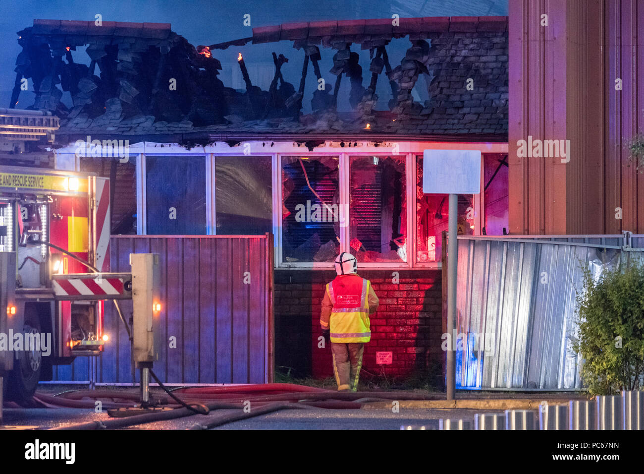 Glasgow, Scotland, UK - 31 July 2018: firefighters working into the ...