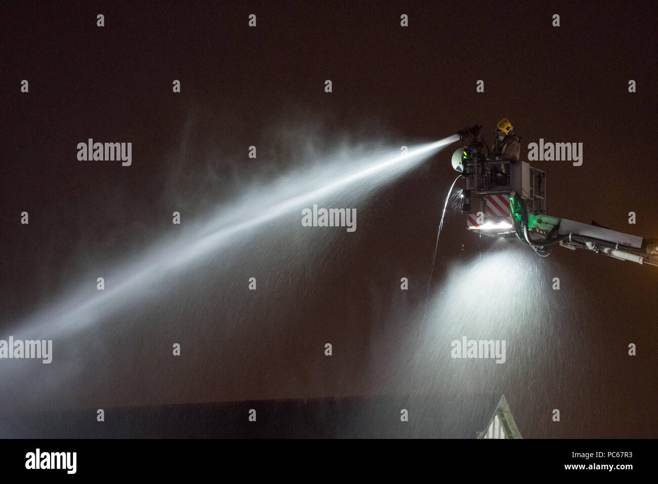 Firefighter hose hi-res stock photography and images - Alamy