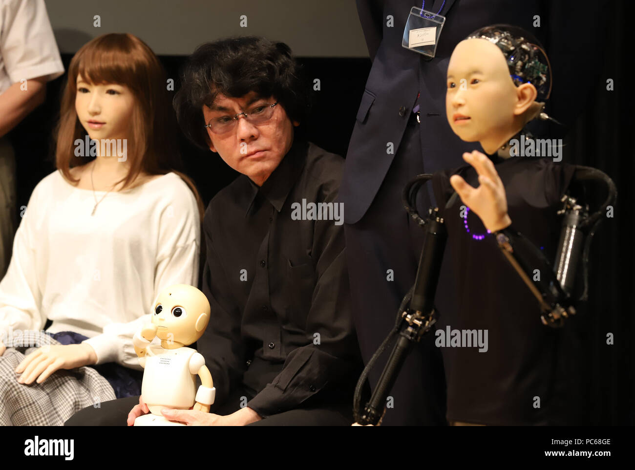 Tokyo, Japan. 31st July, 2018. A child humanoid robot "ibuki" and a ...