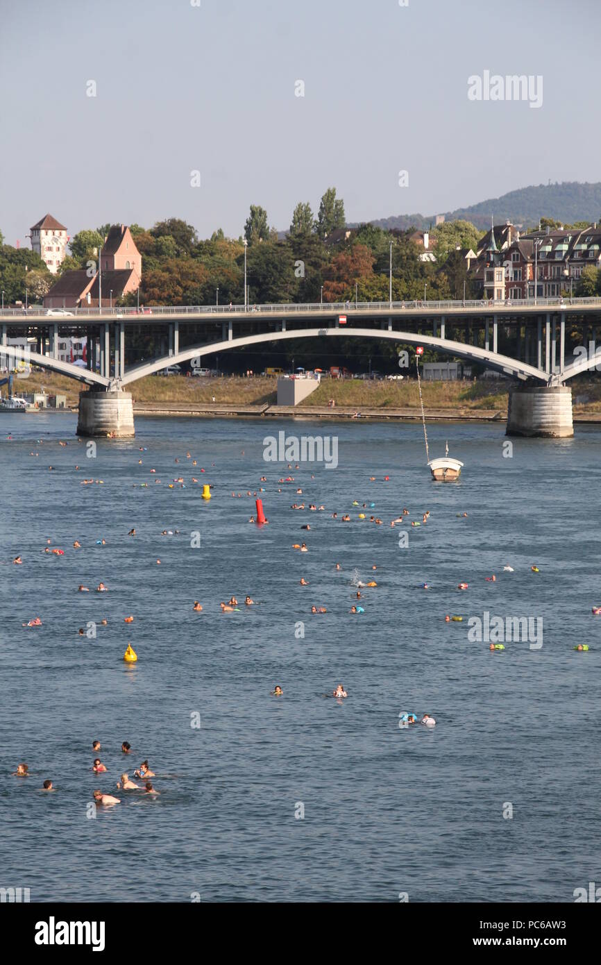 Basel, Switzerland. 31st July 2018. People swimming in the Rhine river ...