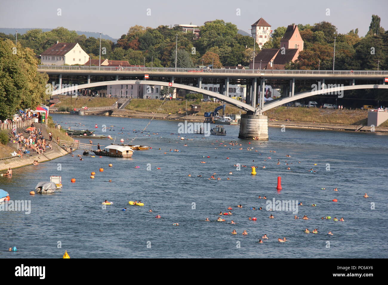 Basel, Switzerland. 31st July 2018. People swimming in the Rhine river ...