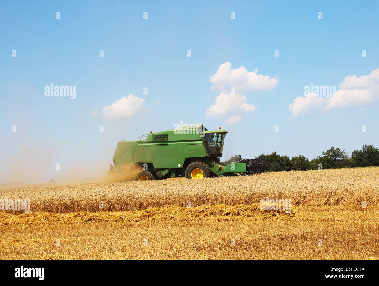 A farmer harvesting his crops Stock Photo - Alamy