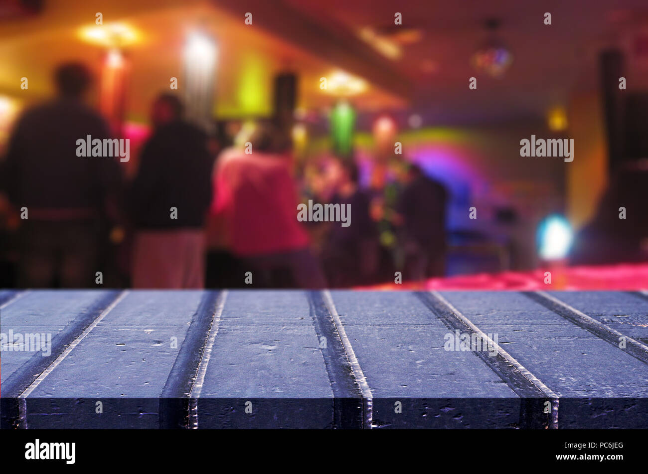 Abstract blurred background. Table or counter and interior of bar.Night ...