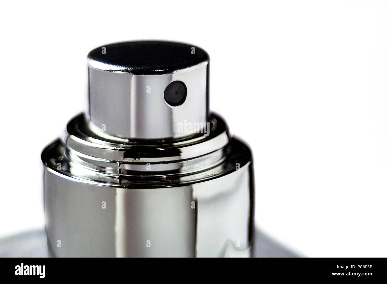 Top of perfume spray bottle isolated macro on white background Stock ...