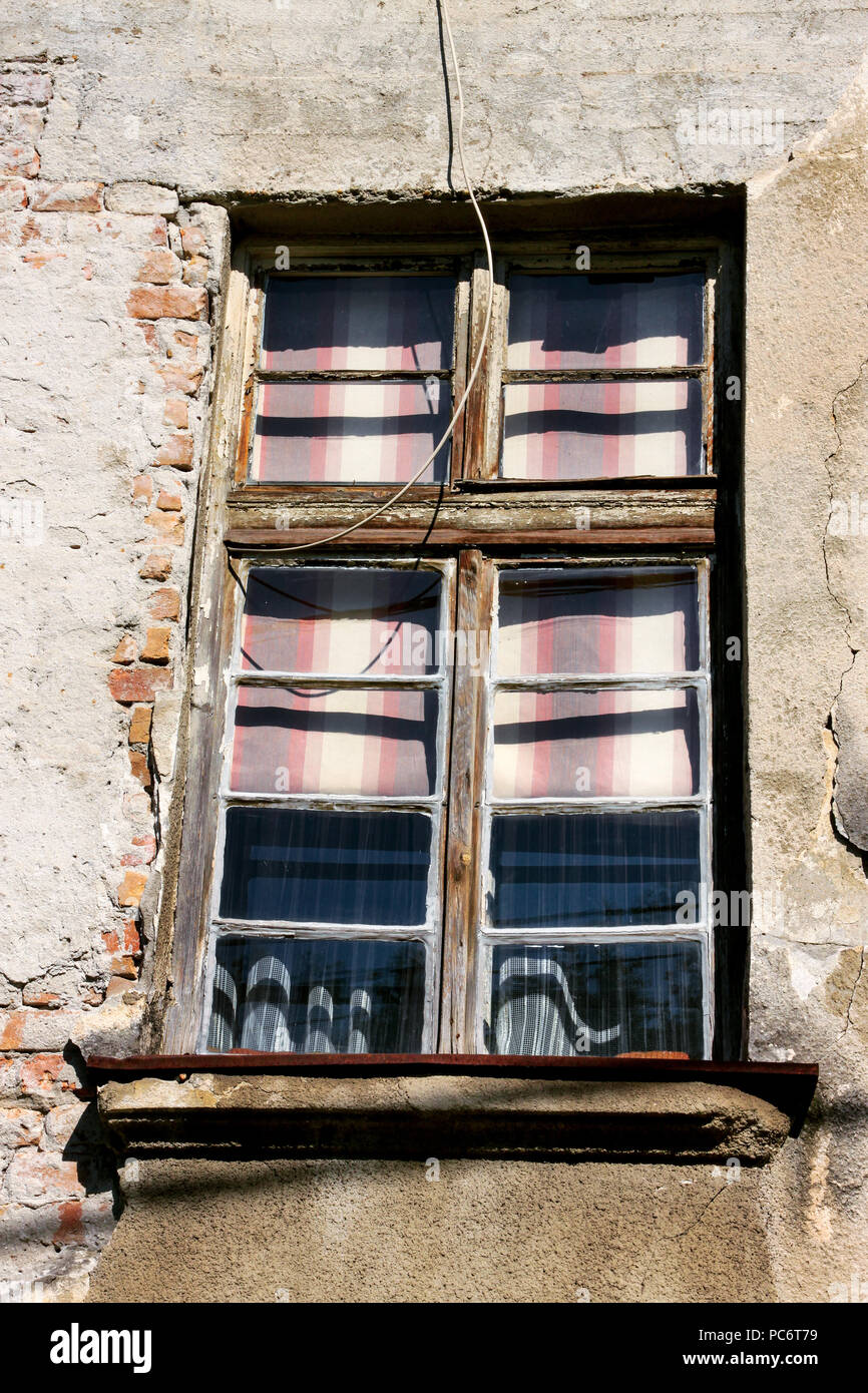 Detail of a wood window on the old house Stock Photo - Alamy