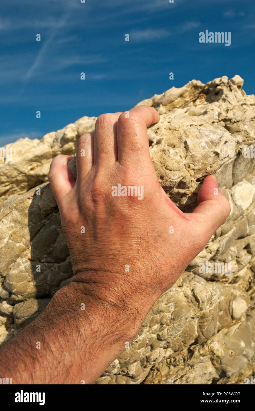 Hand clasping hi-res stock photography and images - Alamy