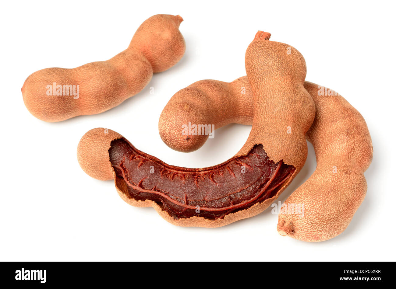 fresh tamarind fruits isolated on white background Stock Photo - Alamy