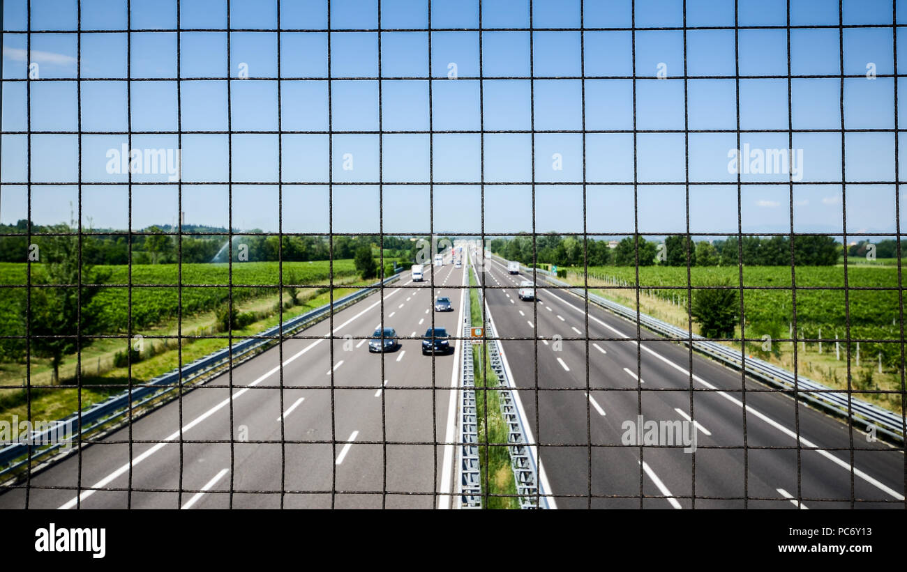 Image of chain link fence on bridge over pass. Chain fence on bridge ...