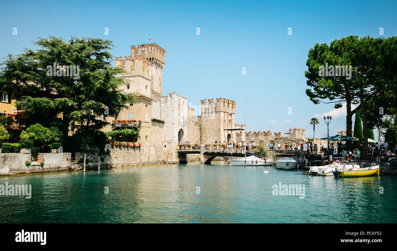 Tourists at medieval Sirmione Scaliger Castle, Italy Stock Photo - Alamy