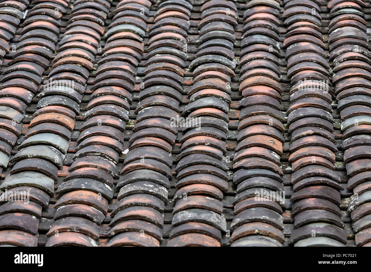 Curved clay roof tiles hi-res stock photography and images - Alamy