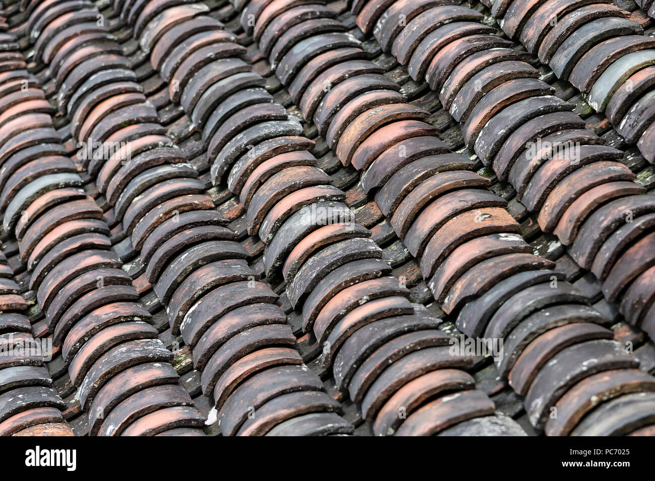 Curved clay roof tiles hi-res stock photography and images - Alamy