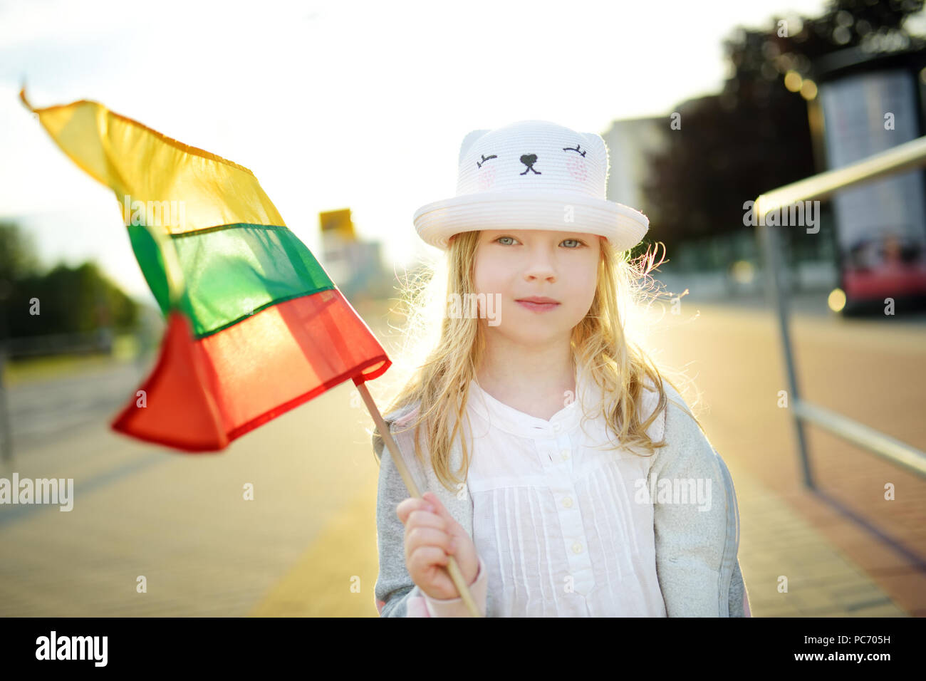 Cute little girl holding tricolor Lithuanian flag on Lithuanian ...