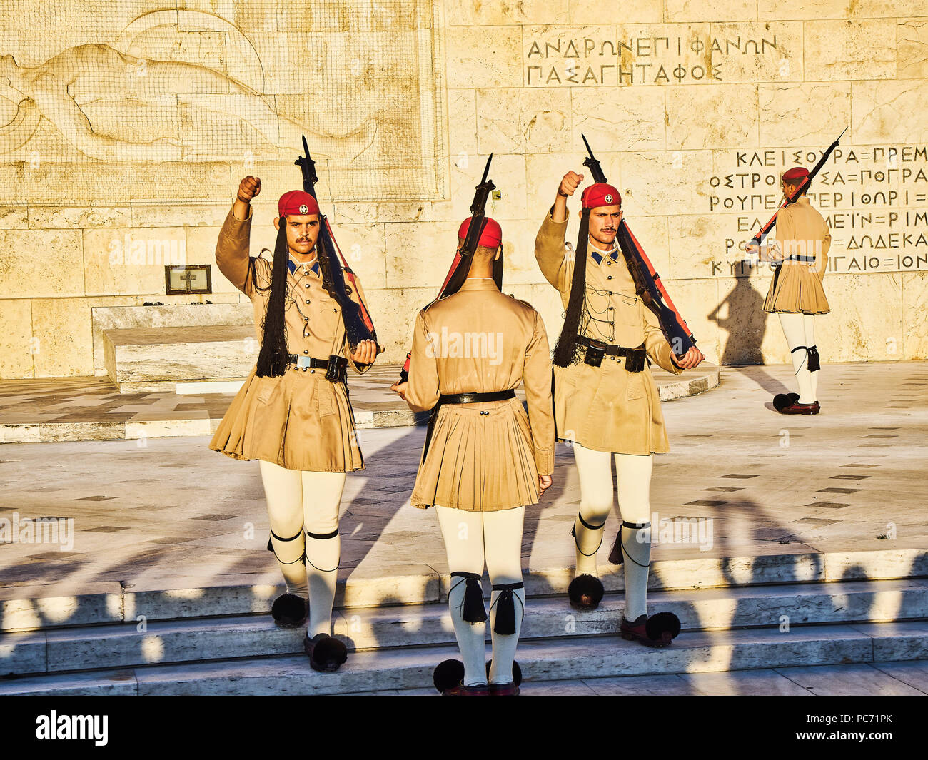 Evzones, members of the presidential guard, during the change of the guard in front of the Tomb ...