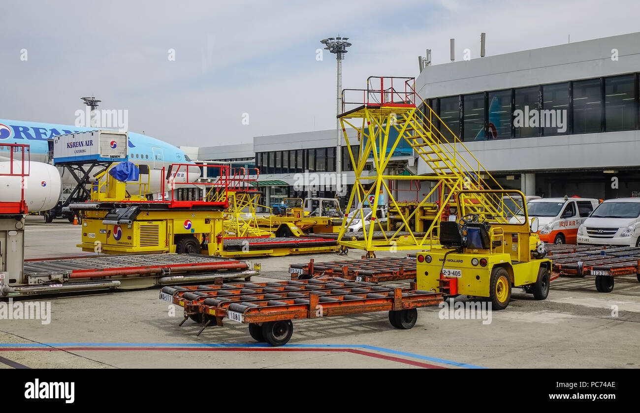Jeju, South Korea - Sep 21, 2016. Passenger airplane docking at Jeju ...