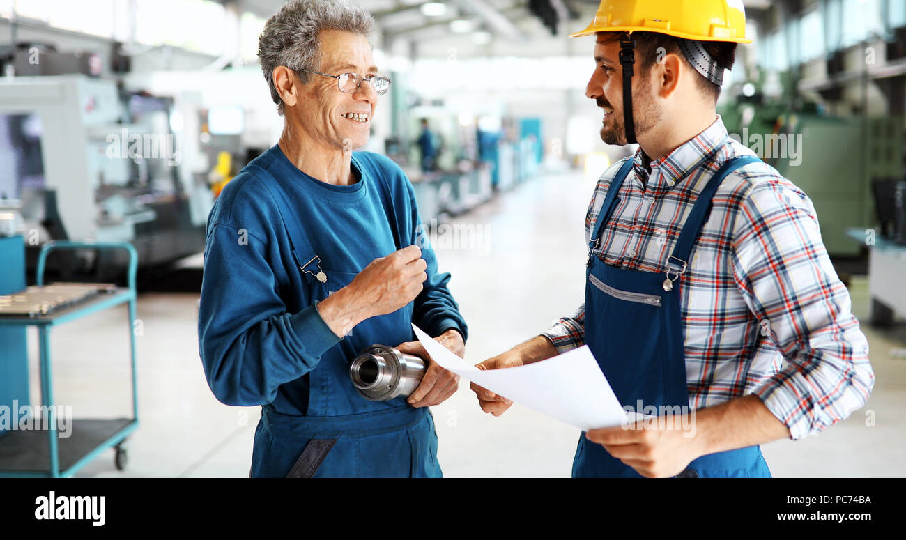 Team factory hi-res stock photography and images - Alamy