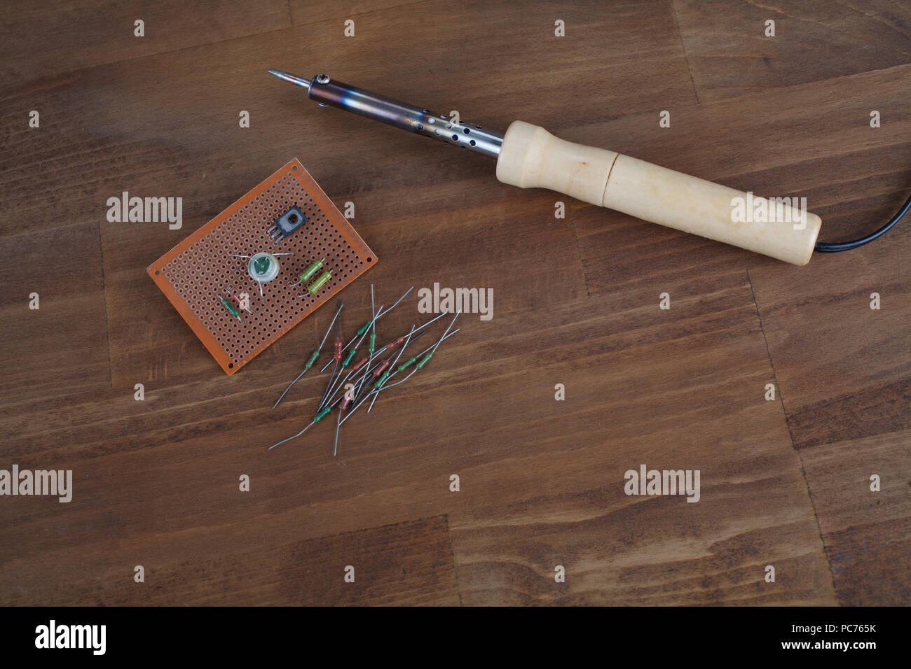 soldering iron - do it yourself concept with vintage retro electronic ...