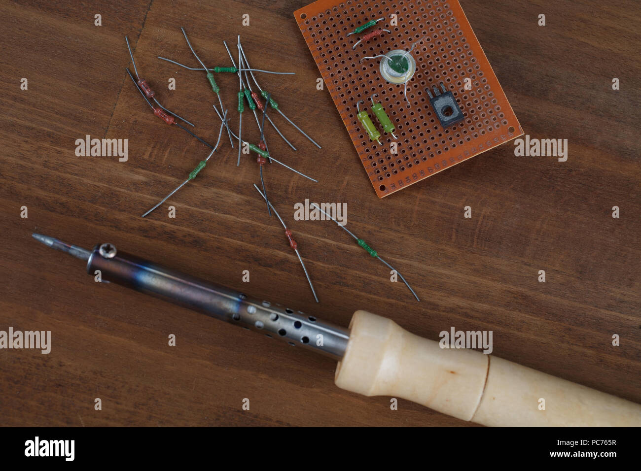 soldering iron - do it yourself concept with vintage retro electronic ...